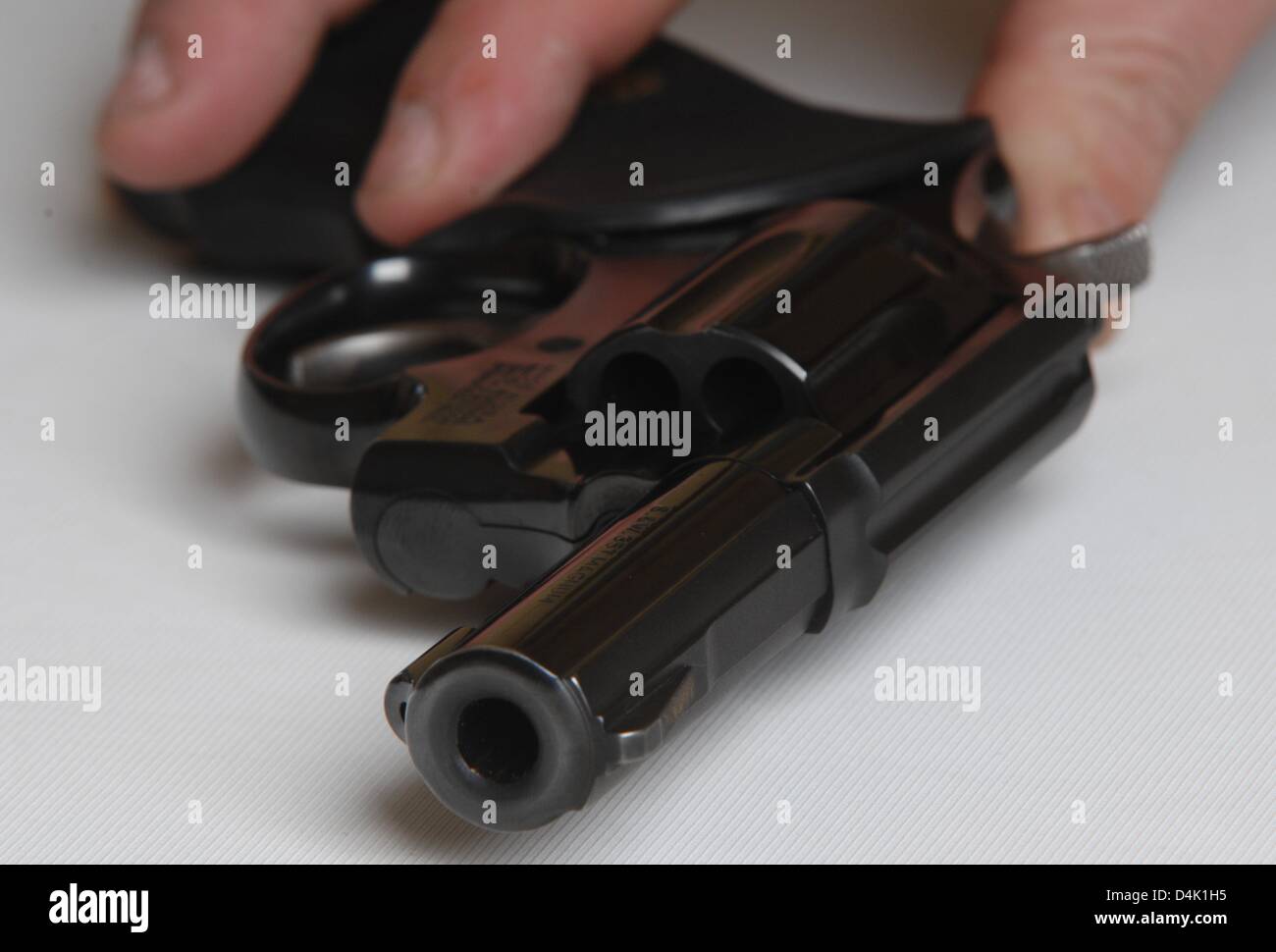 A hand reaches for a revolver by Smith & Wesson in Butzbach near ...