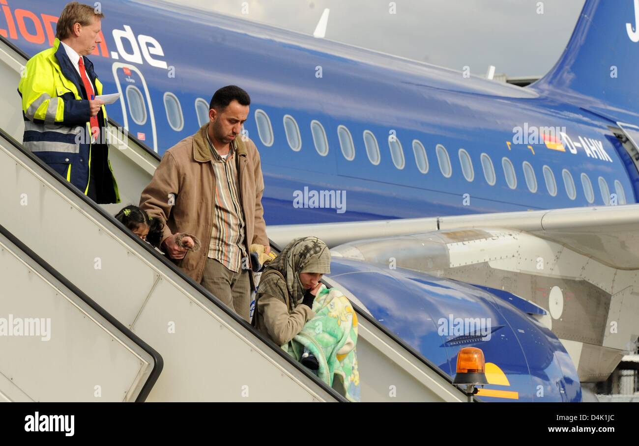 The first 122 refugees from Iraq get off the plane from Damascus on the ...