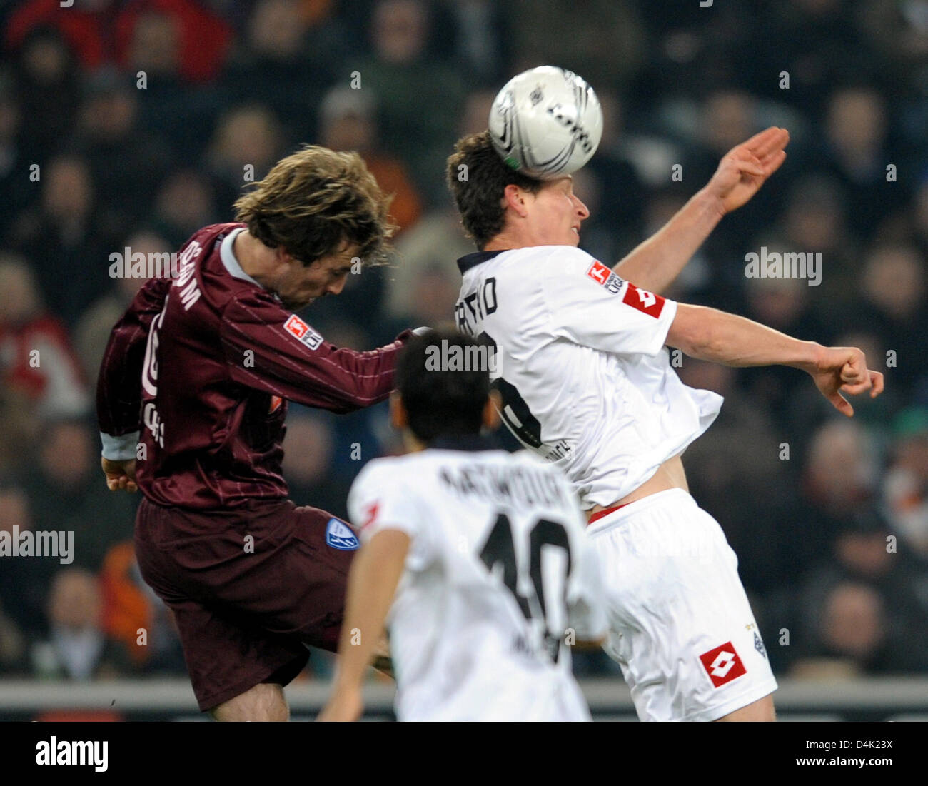 Gladbach?s Rob Friend and Bochum?s Christian Fuchs vie for a header ...