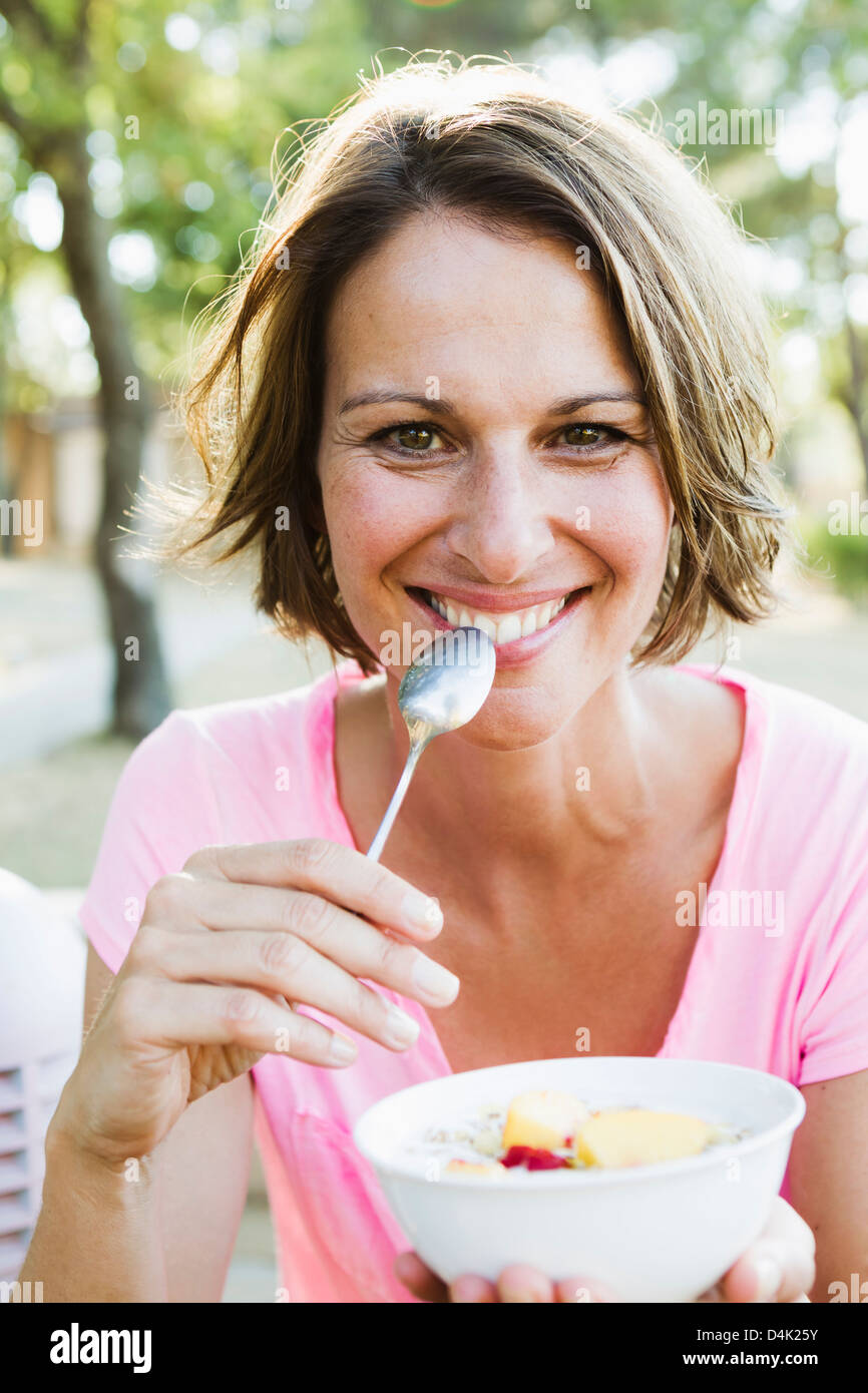 Woman eating happy healthy 40s hi-res stock photography and images - Alamy