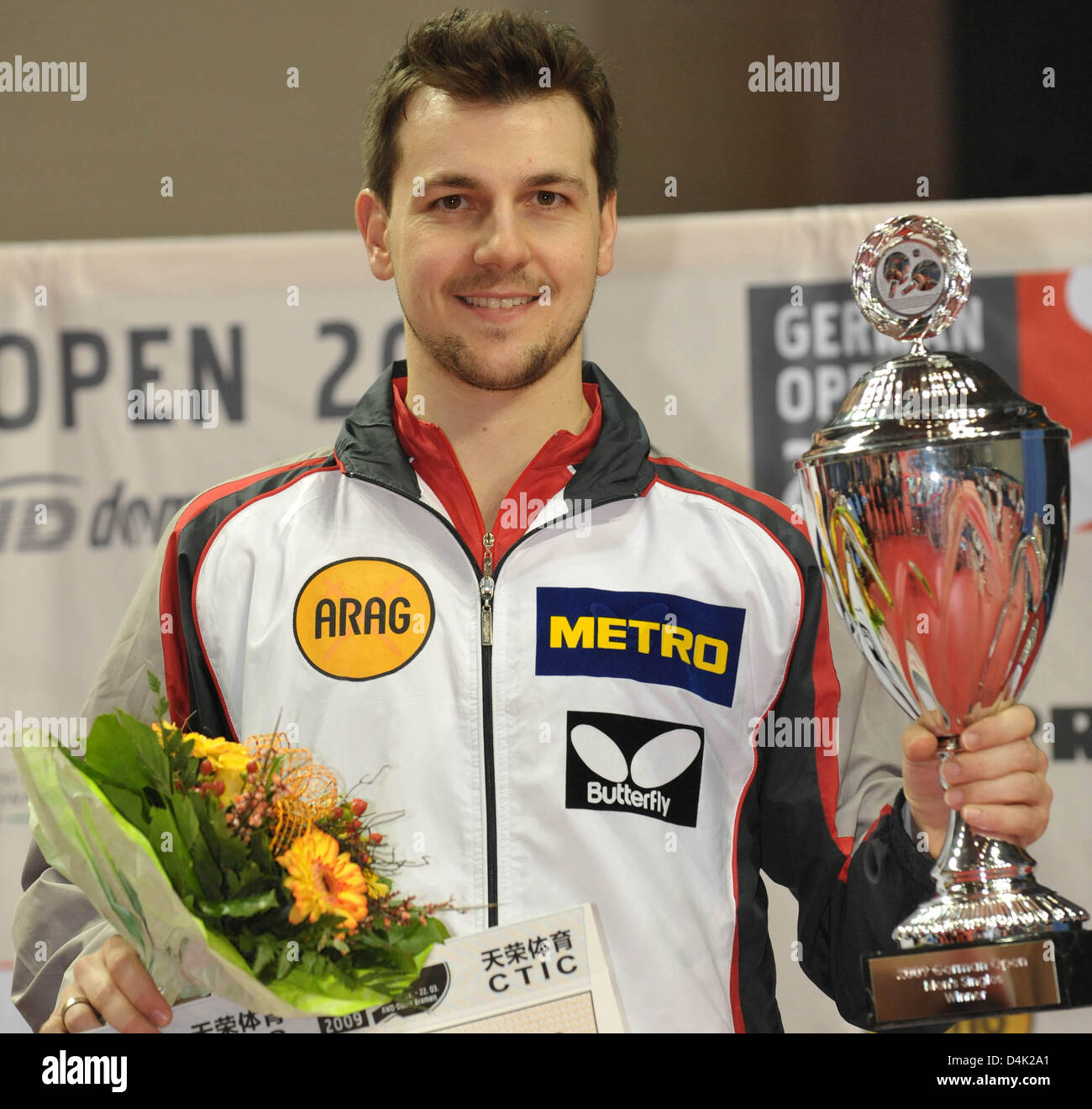 German Timo Boll poses with the trophy for winning the men?s singles of ...