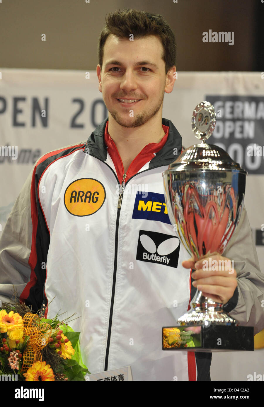 German Timo Boll poses with the trophy for winning the men?s singles of ...