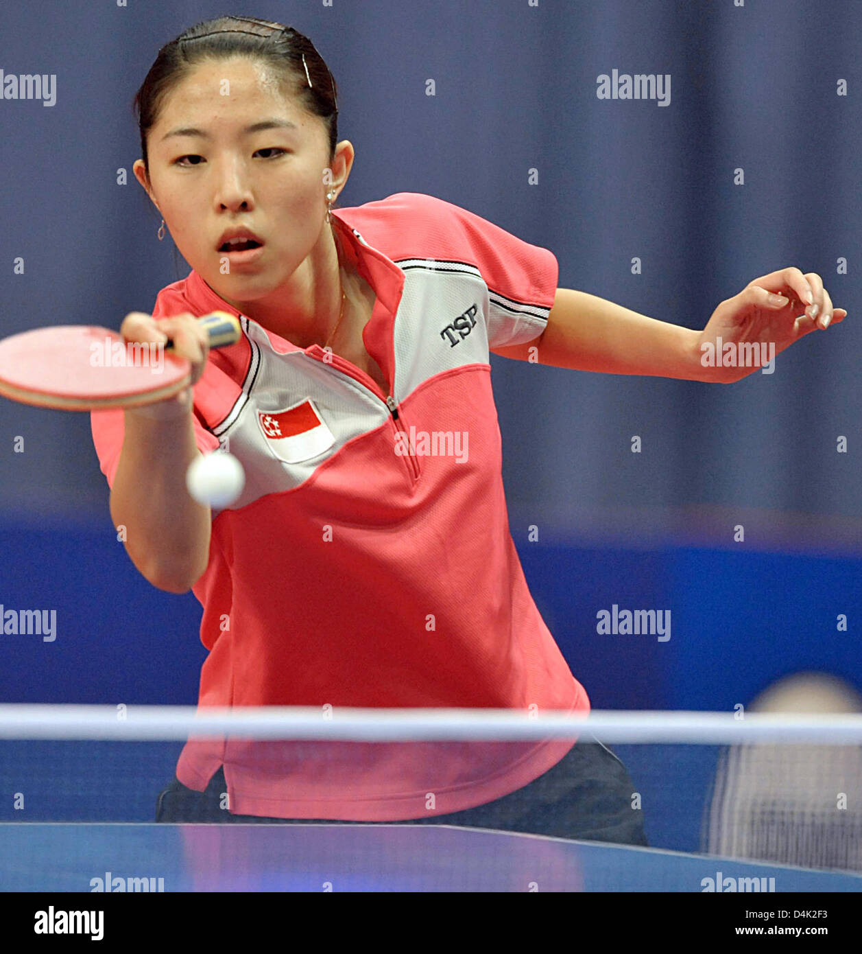 Yu Meng Yu from Singapore plays the ball against Belarusian Pavlovich ...