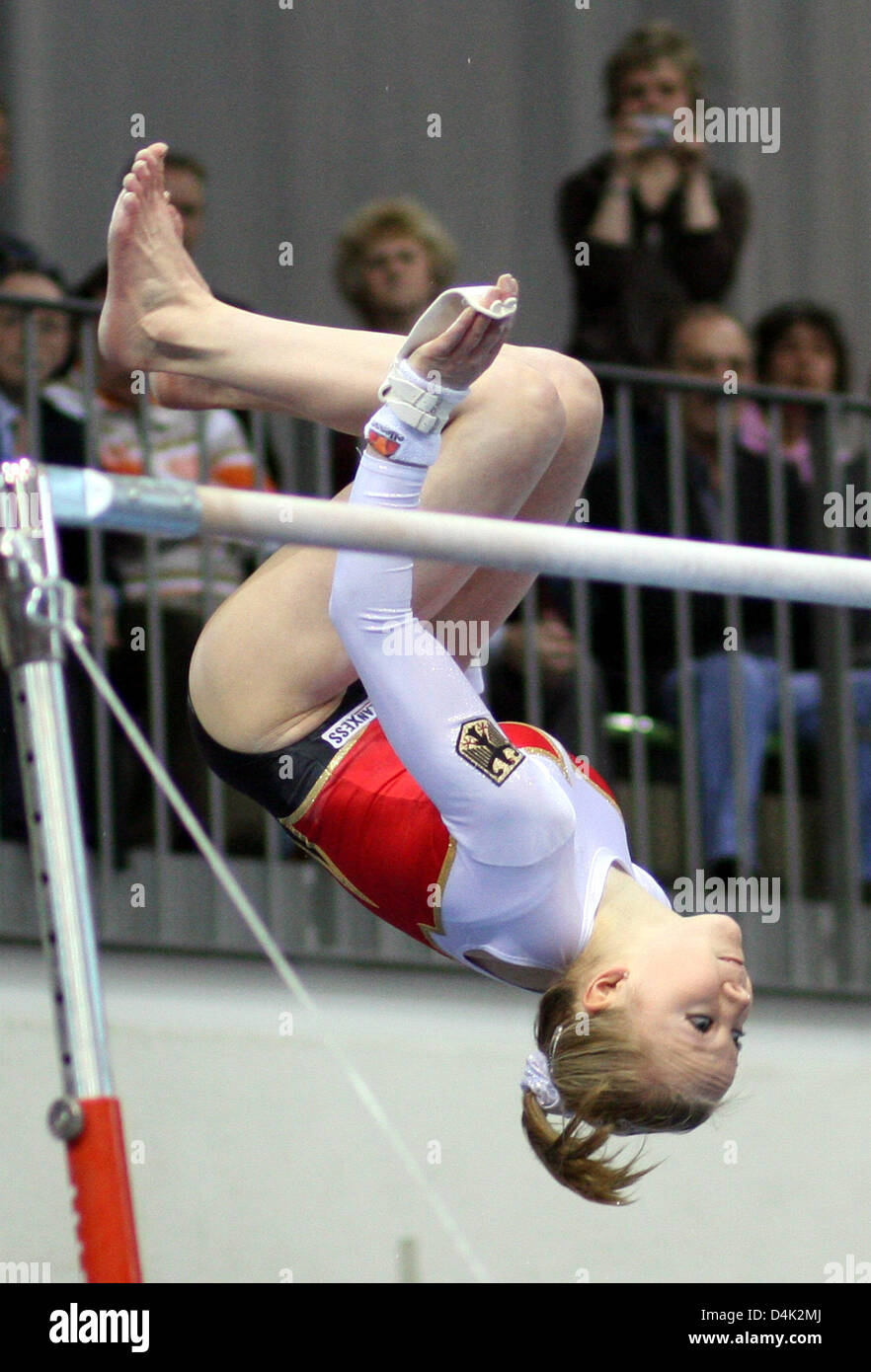 Gymnast Anja Brinker (Germany) performs on the uneven bars during the ...