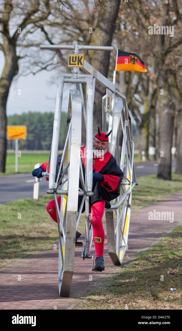 German action artist and bicycle designer Dieter Senft poses with his ...