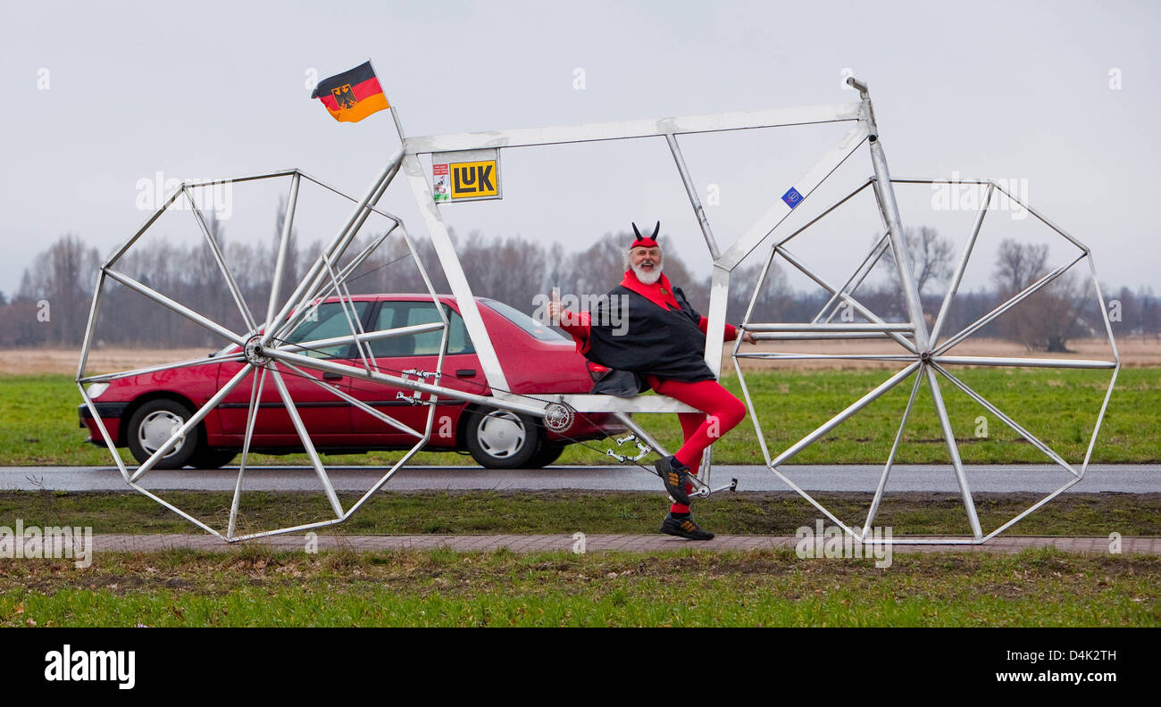 German action artist and bicycle designer Dieter Senft poses with his ...
