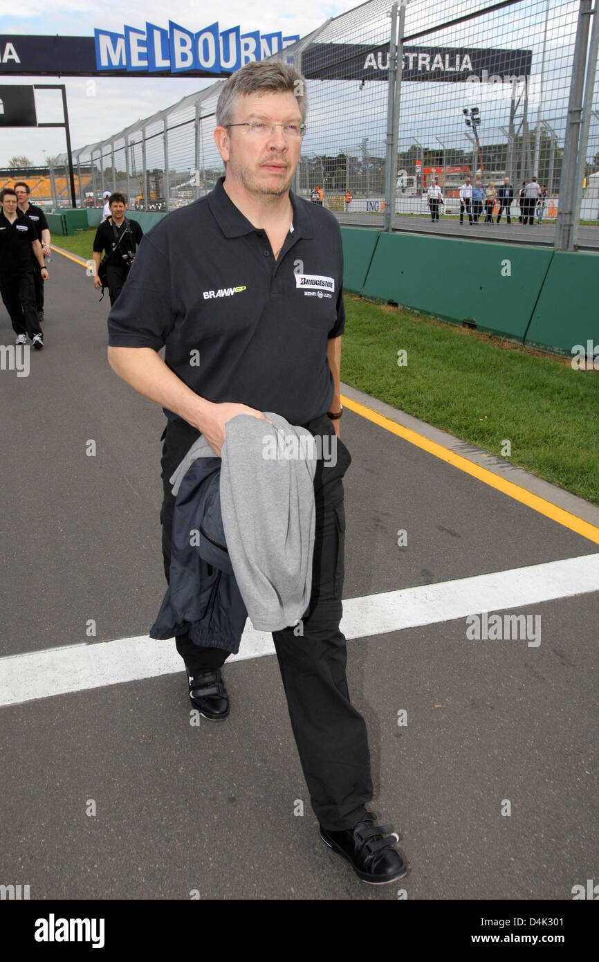 British Ross Brawn, owner of Team Brawn GP, walks across the track at ...