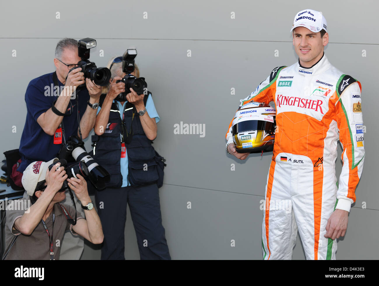 German Formula One driver Adrian Sutil (R) of Force India poses during ...