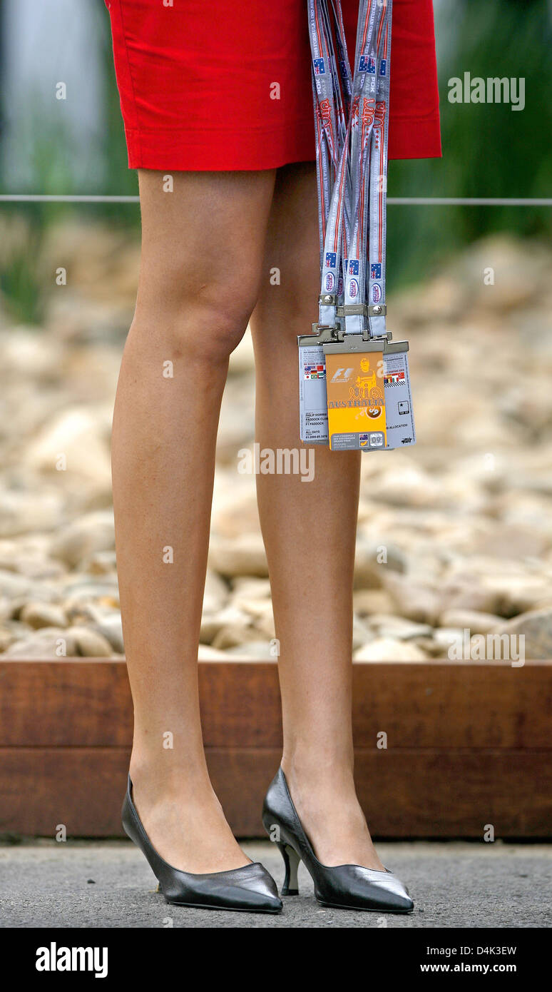 A Ferrari hostess holds credentials at Albert Park Circuit in Melbourne ...