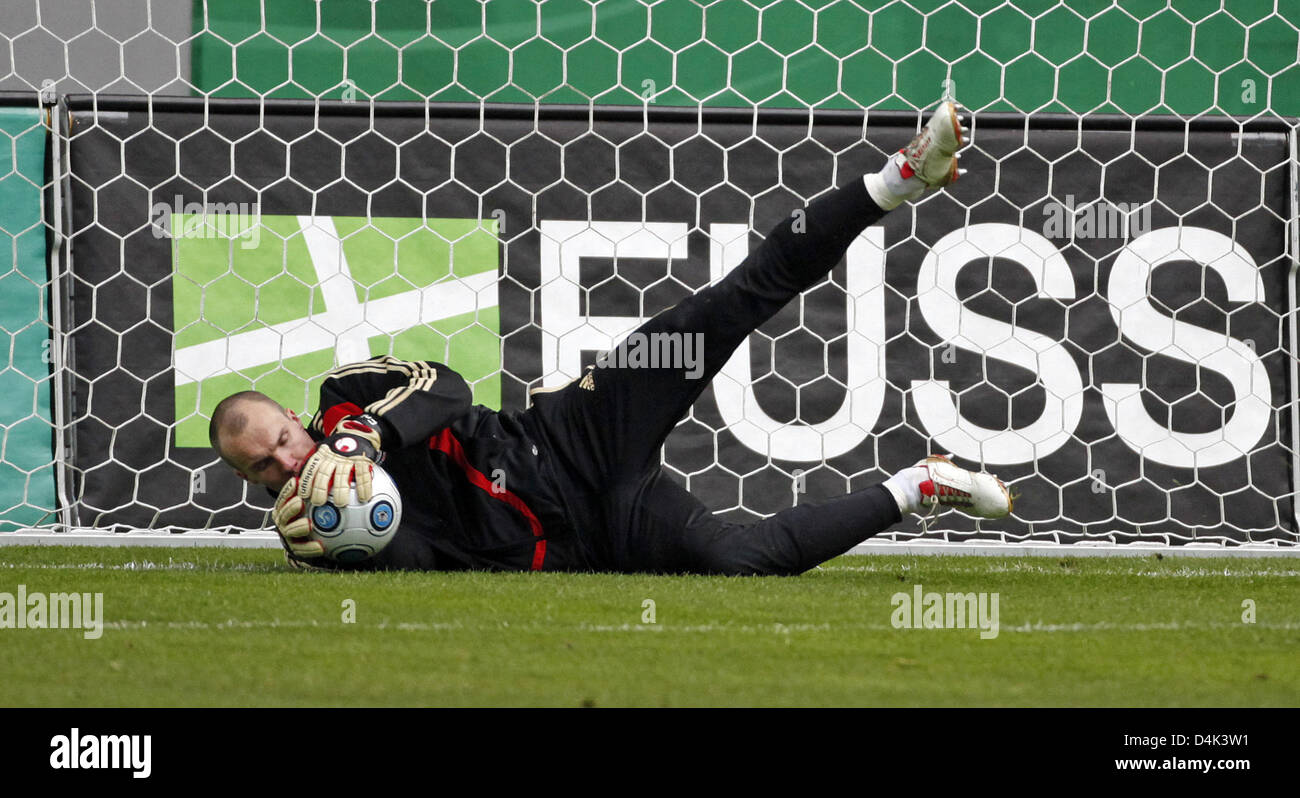 German national goalie Robert Enke saves a ball during the training at ...
