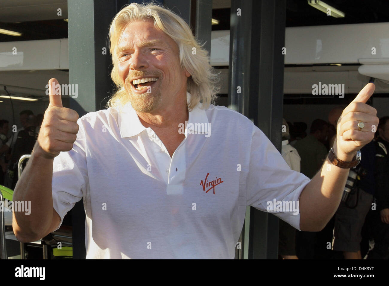 Virgin owner Sir Richard Branson celebrates after the two drivers of ...