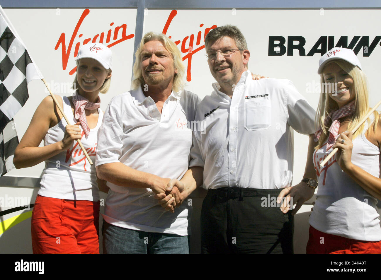 Virgin owner Sir Richard Branson (2-L) and Ross Brawn (2-R), owner of ...