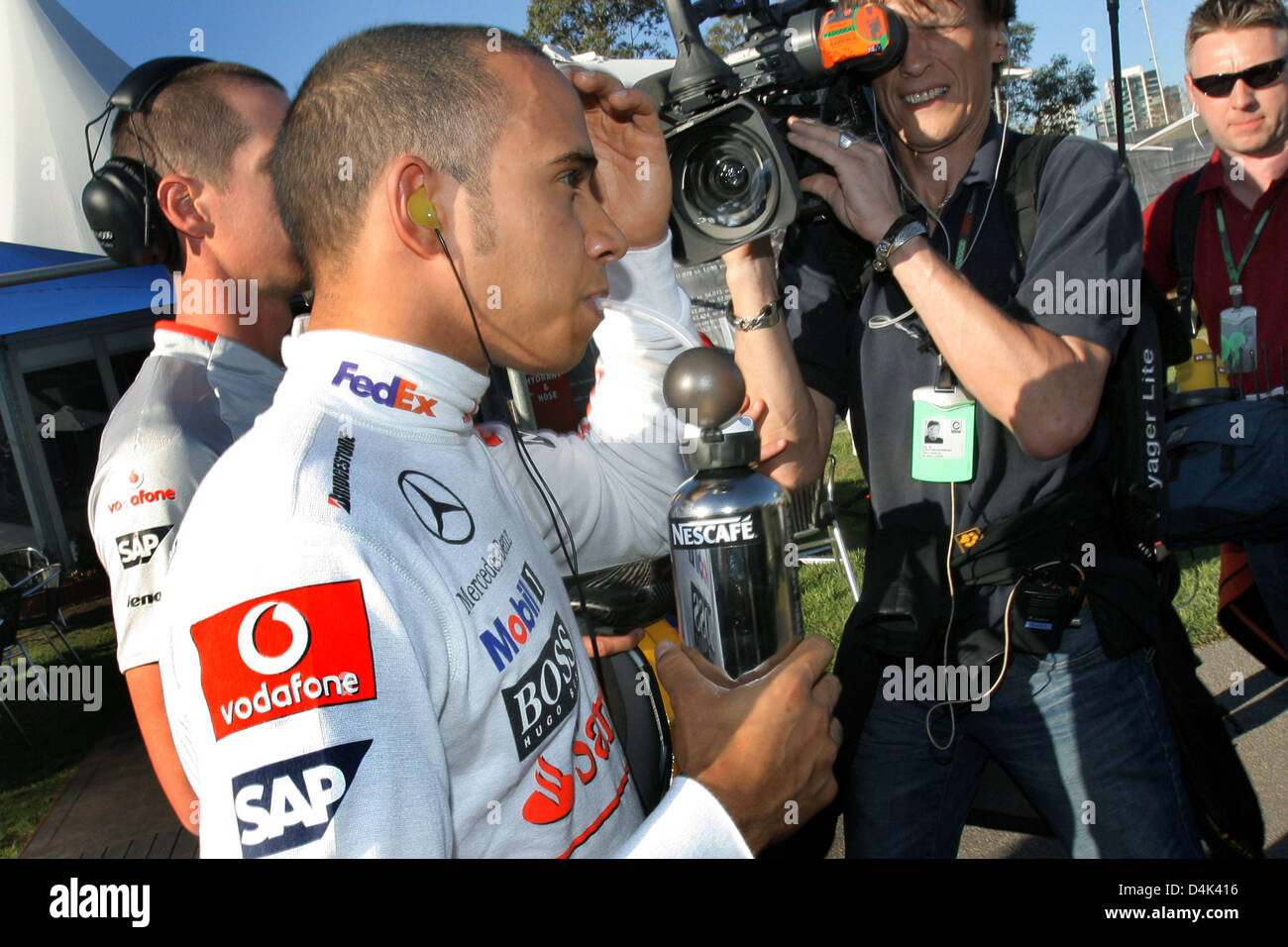 Lewis hamilton melbourne paddock hi-res stock photography and images ...