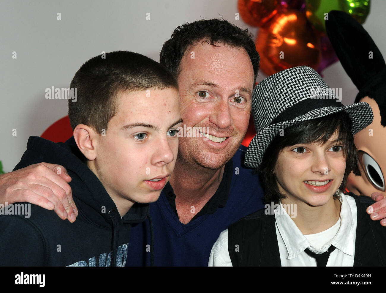 Dutch Disney Club presenter Jochem van Gelder (C) arrives for the ...