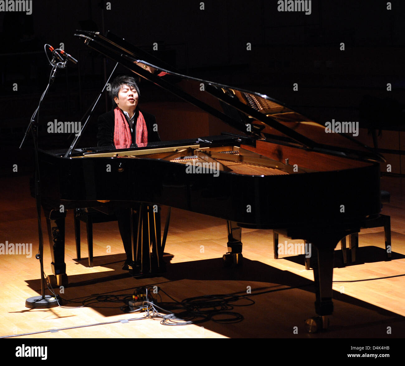 Chinese star pianist Lang Lang performs on the grand piano in Hamburg ...