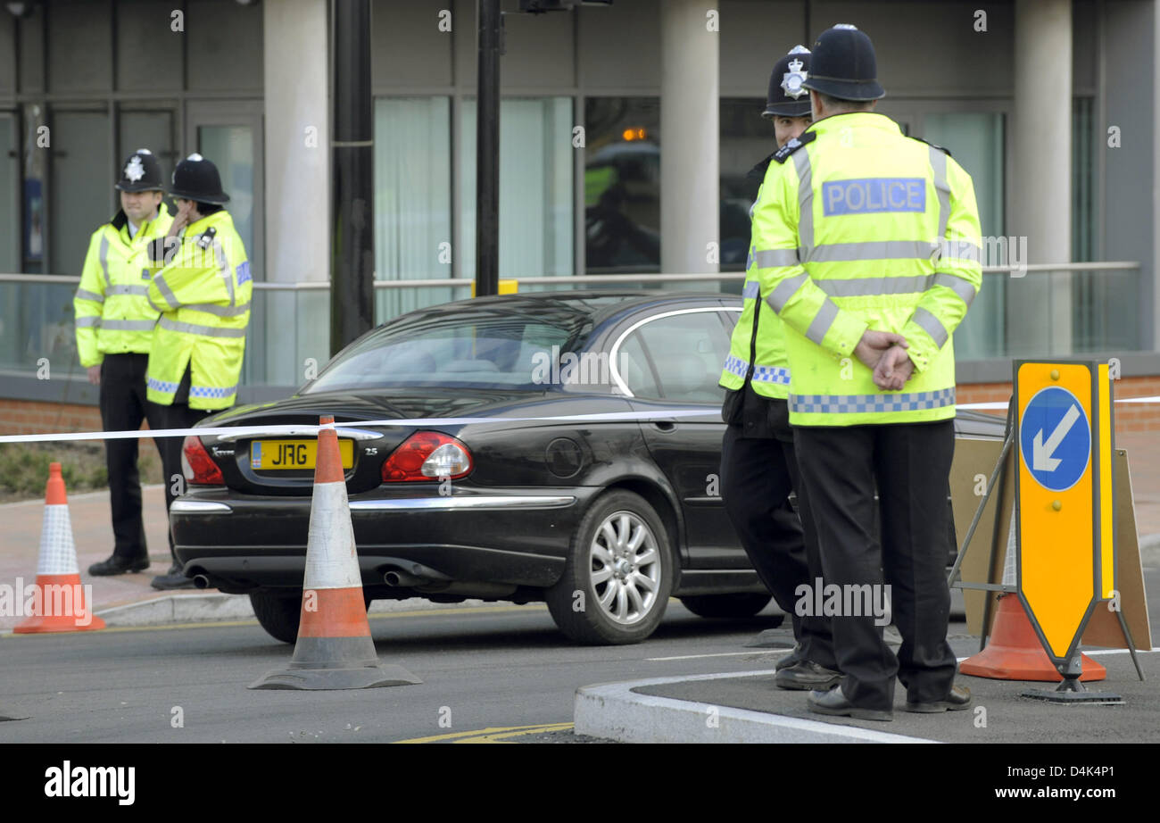 Police officers guard the entry area to ExCel conference centre in ...