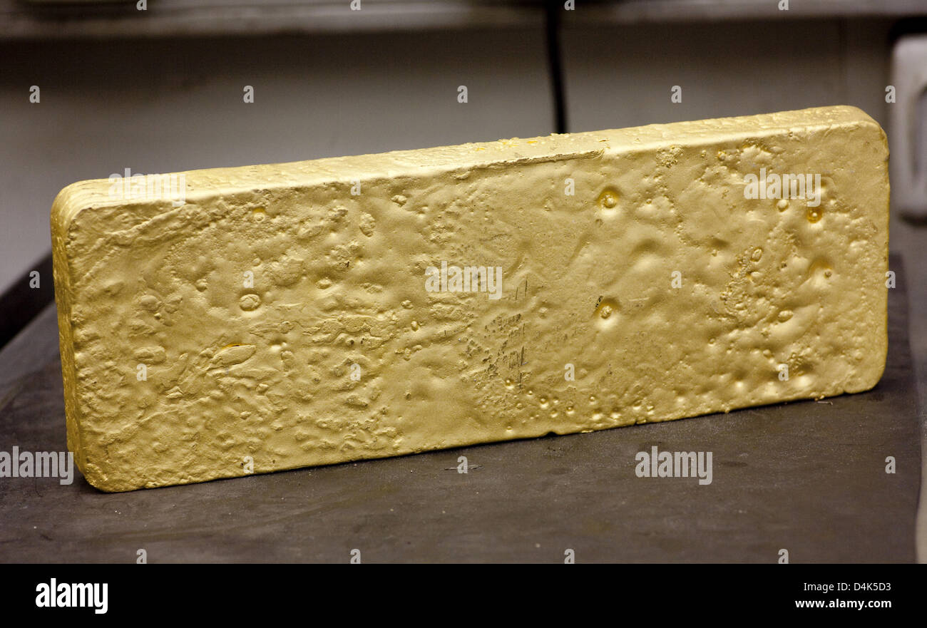 The picture shows a gold bar that was melted from old gold at the ...