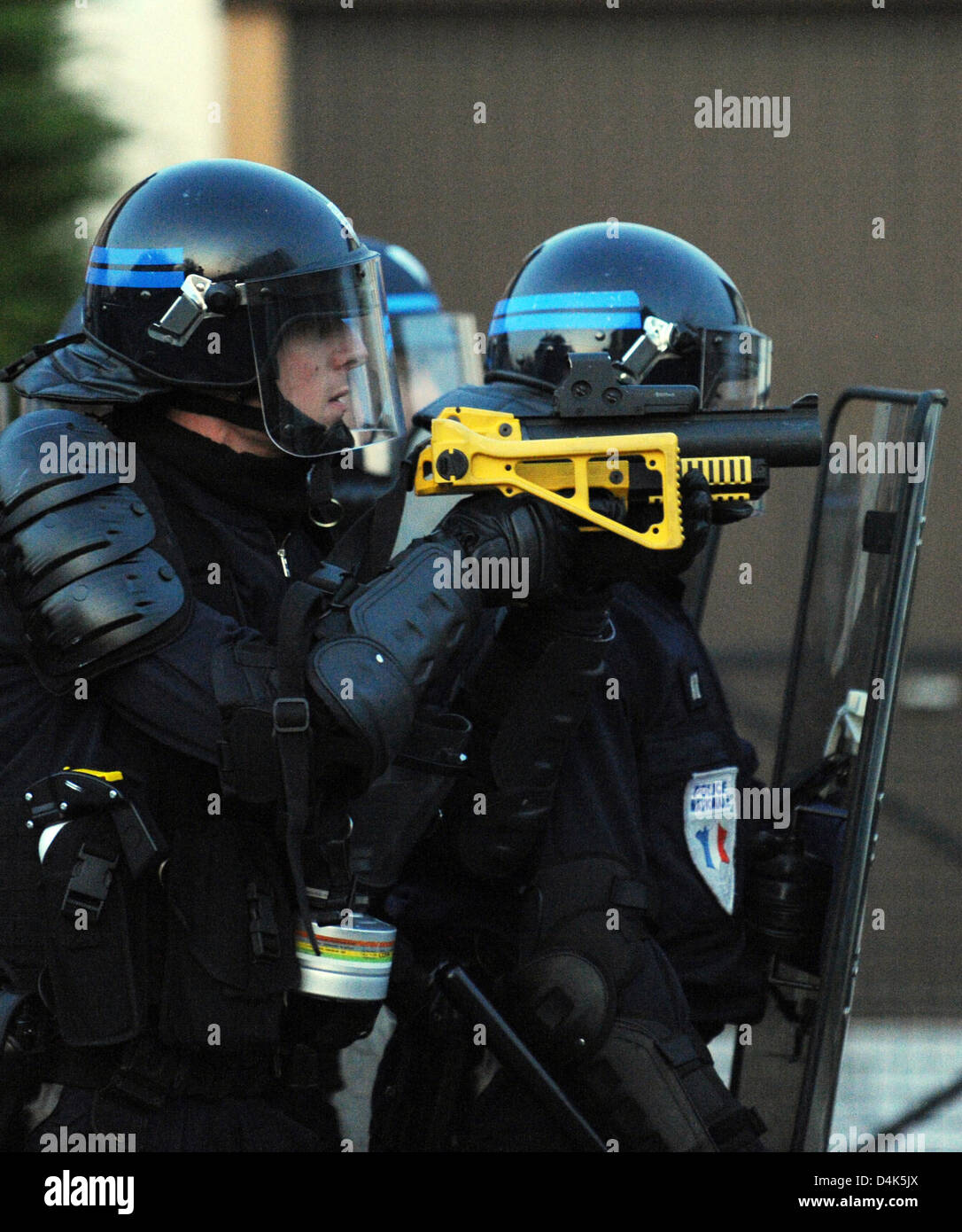 Special units of the French police with tear gas guns move forward ...