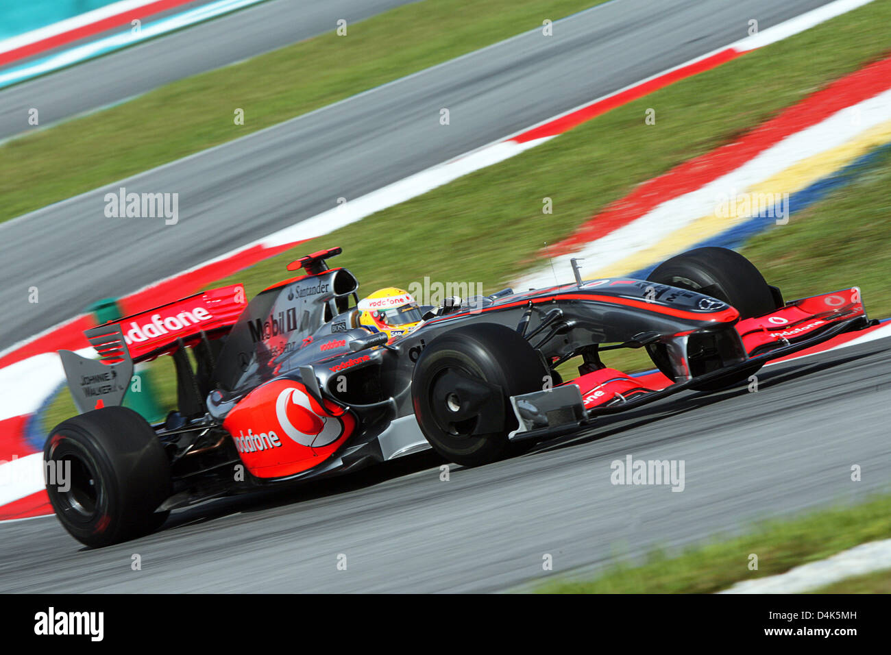 British Formula One driver Lewis Hamilton of McLaren Mercedes steers ...