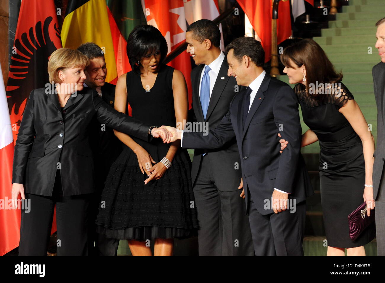 (L-R) German Chancellor Angela Merkel, her husband Joachim Sauer ...