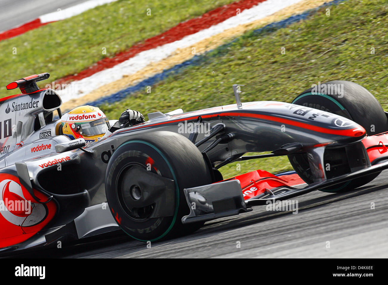 British Formula One driver Lewis Hamilton of McLaren Mercedes steers ...
