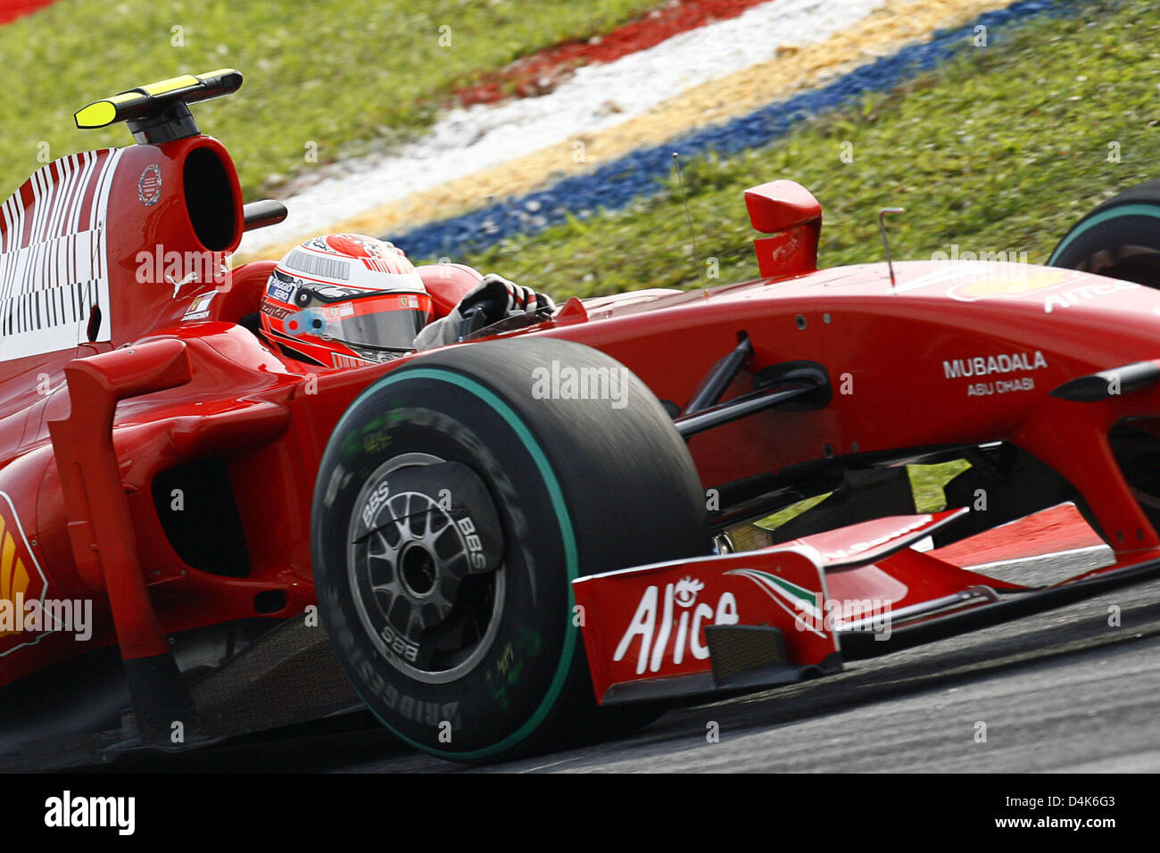 Finnish Formula One driver Kimi Raikkonen of Scuderia Ferrari takes a ...