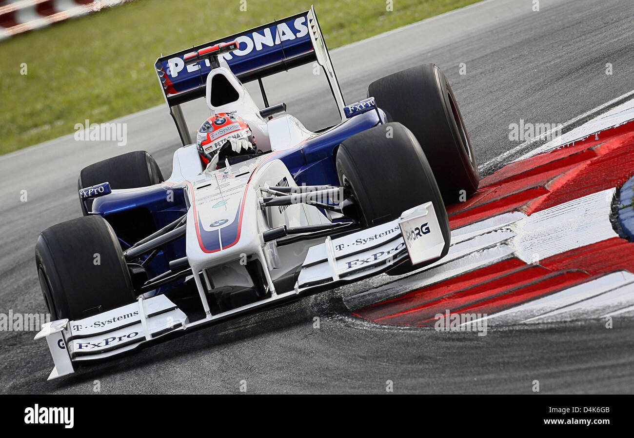 Polish Formula One driver Robert Kubica of BMW Sauber enters a turn ...