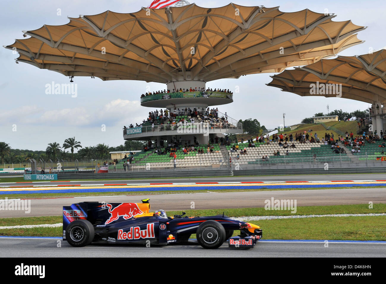 German Formula One driver Sebastian Vettel of Red Bull Racing steers ...
