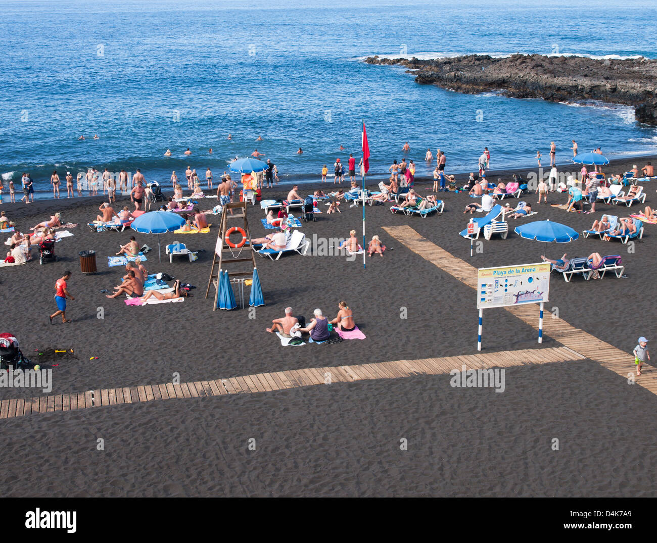 The beach of Playa La Arena a resort town on the west coast of Tenerife ...