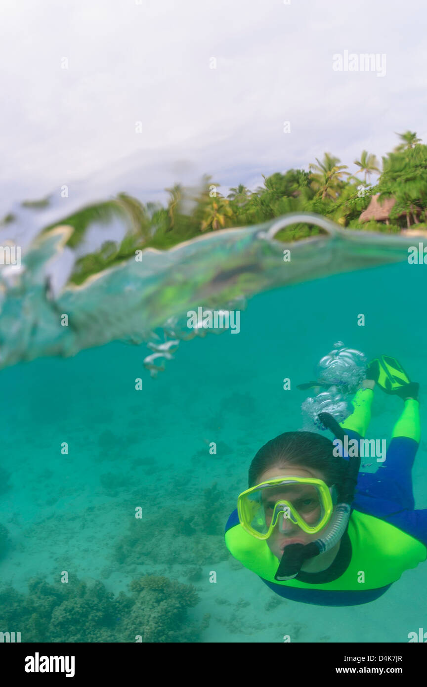 Snorkeler swimming underwater Stock Photo - Alamy