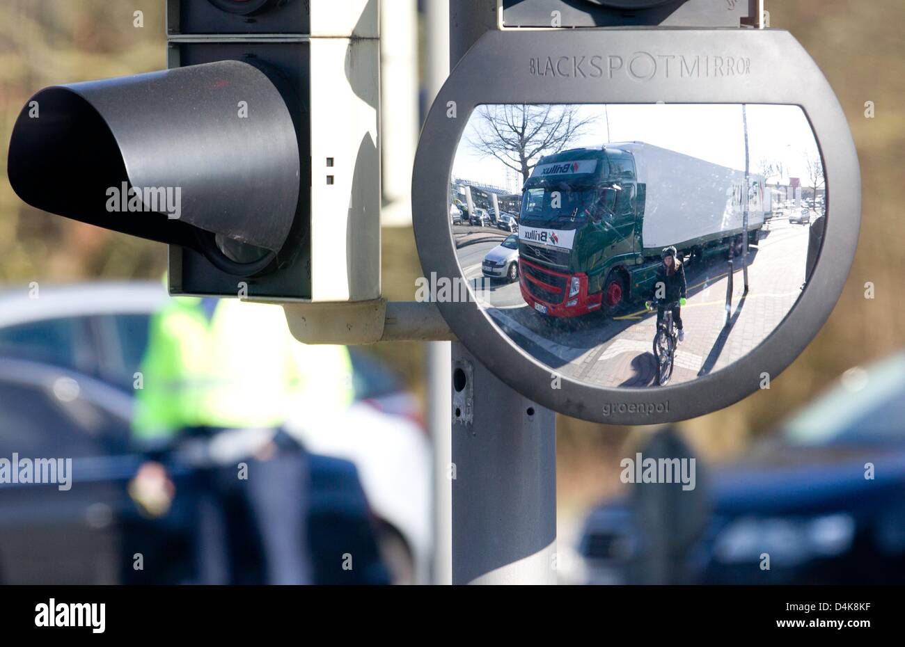 A traffic light with a built-in mirror is pictured in Muenster, Germany ...