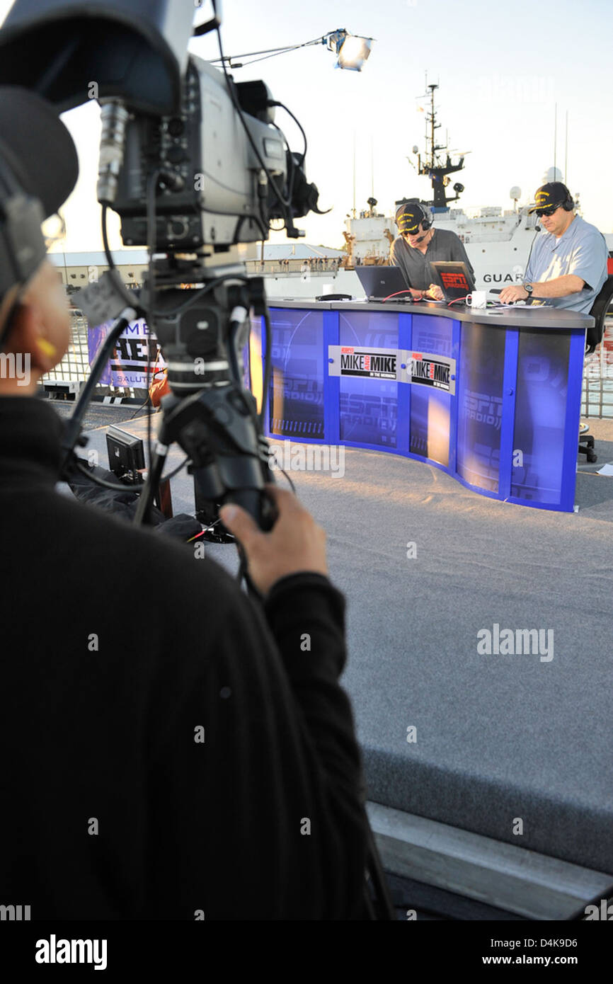 A cameraman films an ESPN show, capturing the excitement of a live ...