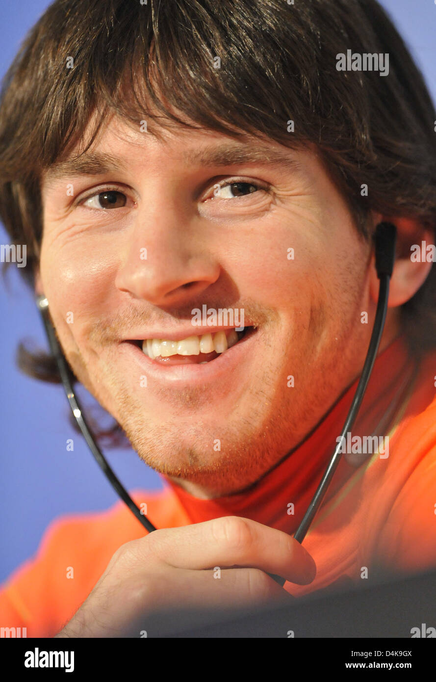 Spanish Primera Division club FC Barcelona?s Lionel Messi smiles during ...