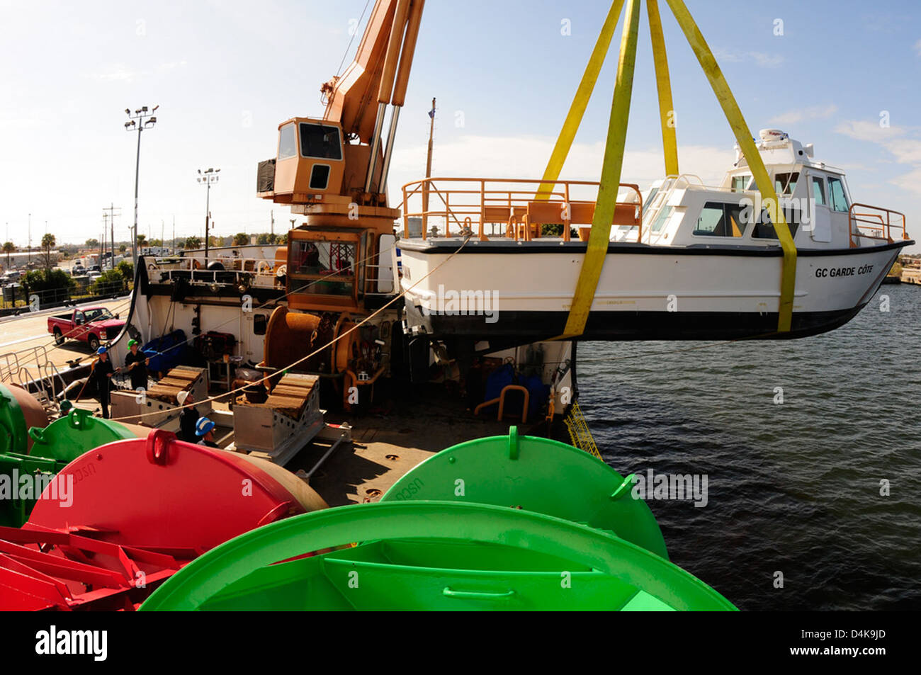 The Coast Guard Cutter Oak loaded a 41-foot utility boat for deployment ...