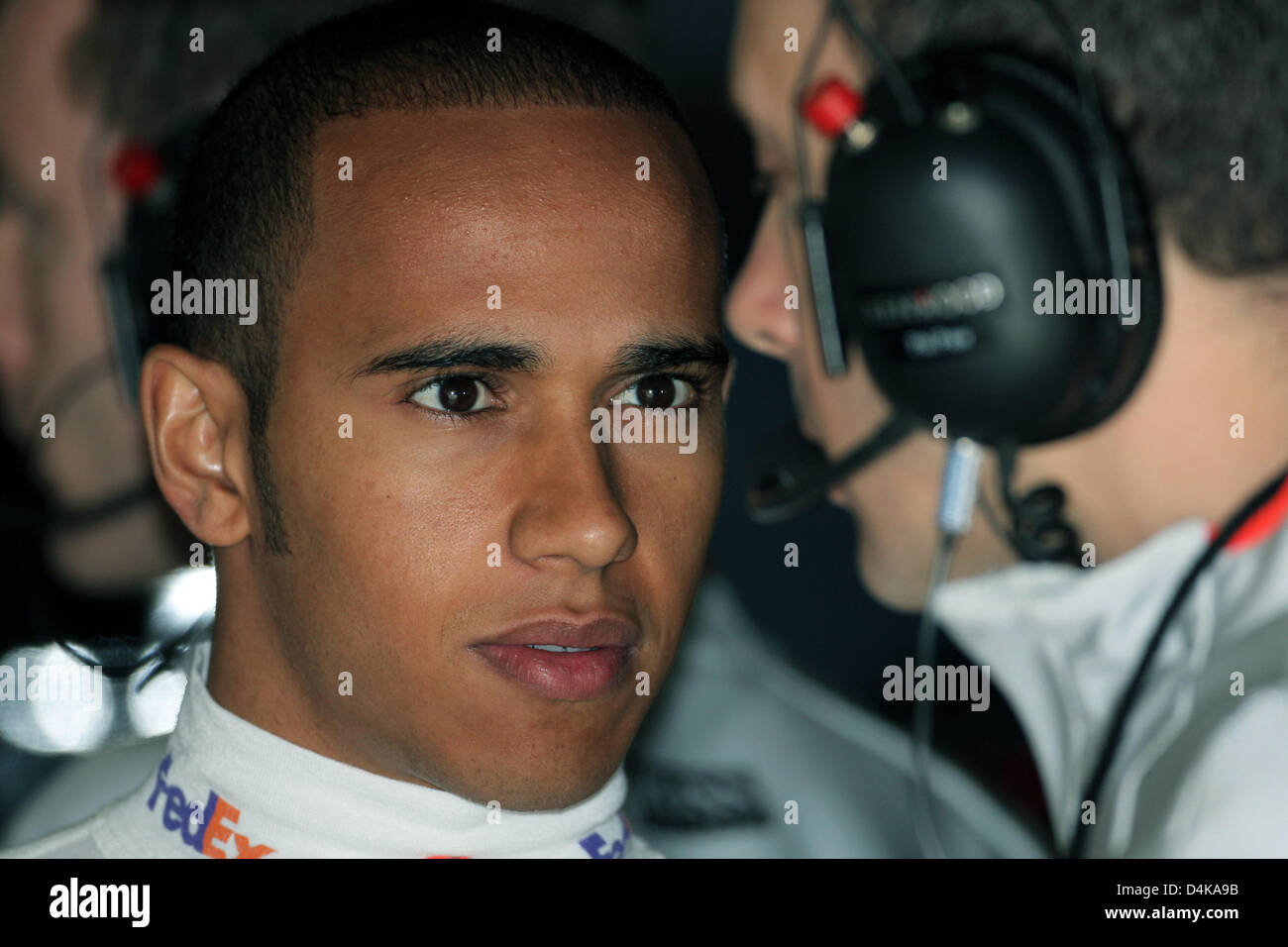 British Formula One driver Lewis Hamilton of McLaren Mercedes talks to ...