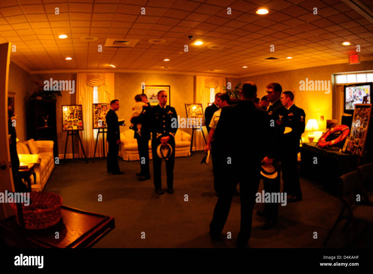 The U.S. Coast Guard honors Boatswain’s Mate Corey Rozell during his ...