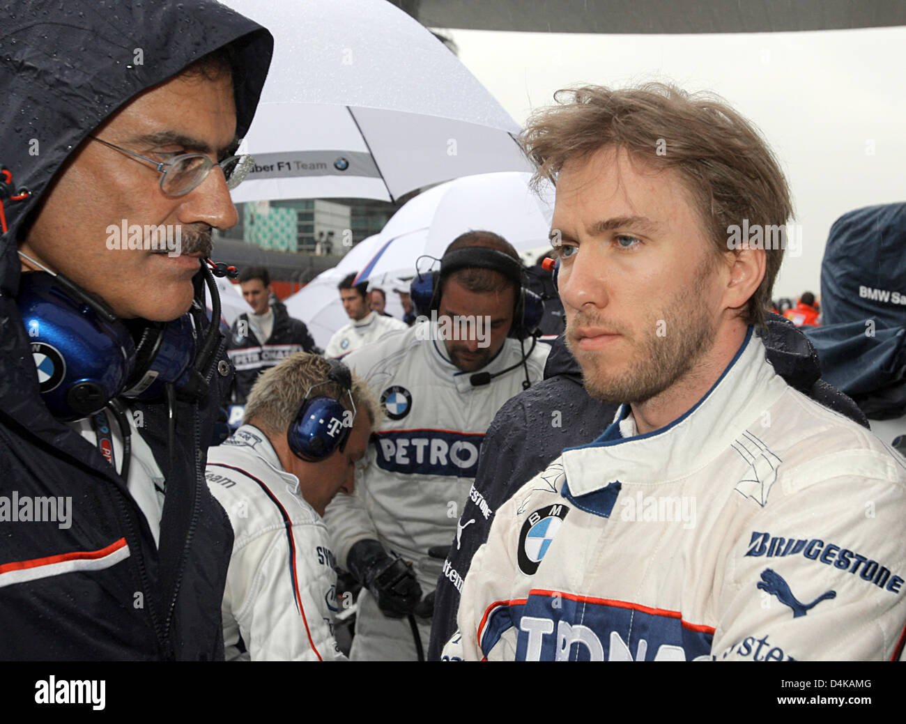 German Formula One driver Nick Heidfeld of BMW Sauber (R) and team ...