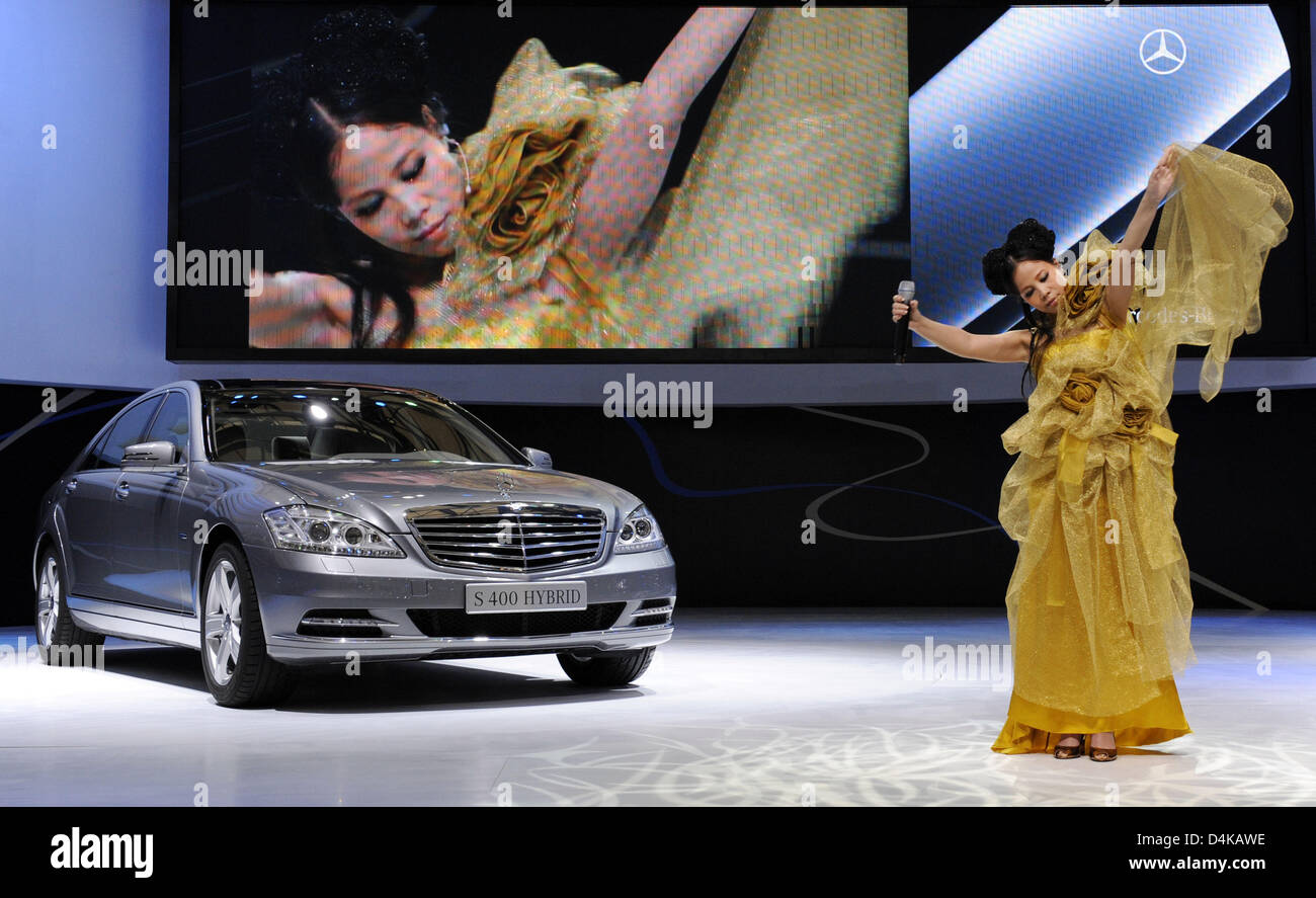 Chinese singer Dadawa poses next to a Mercedes-Benz S400 Hybrid on the ...