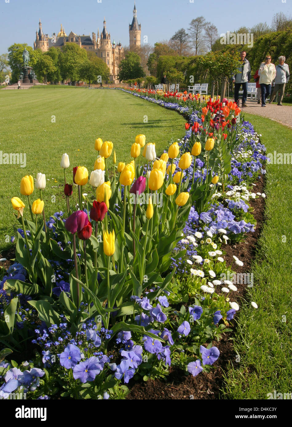 Visitors walk on the premises of the German Federal Horticultural ...