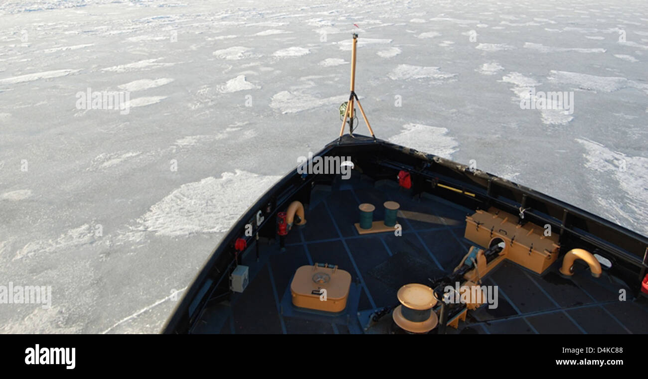 CGC Sturgeon Bay, a U.S. Coast Guard icebreaker, navigates smooth ice ...