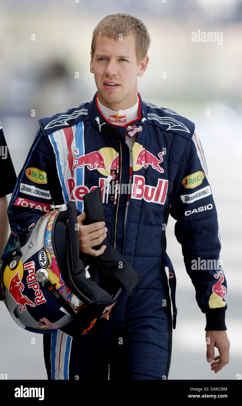 German Formula One driver Sebastian Vettel of Red Bull Racing walks on ...