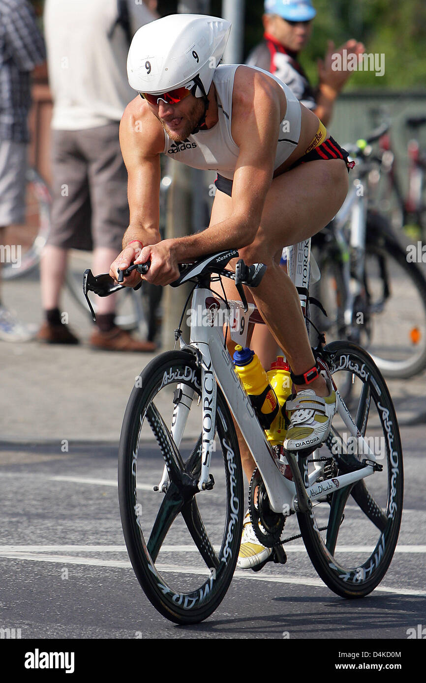 Germany?s Faris Al-Sultan cycles through Hochstadt during the Ironman ...