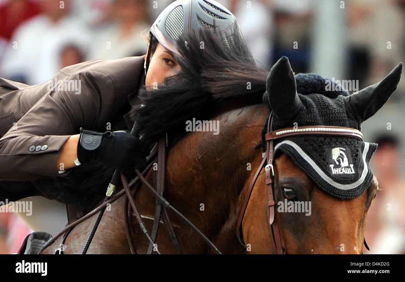 French jumping equestrian Penelope Leprevost cuddles her horse ?Jubilee ...