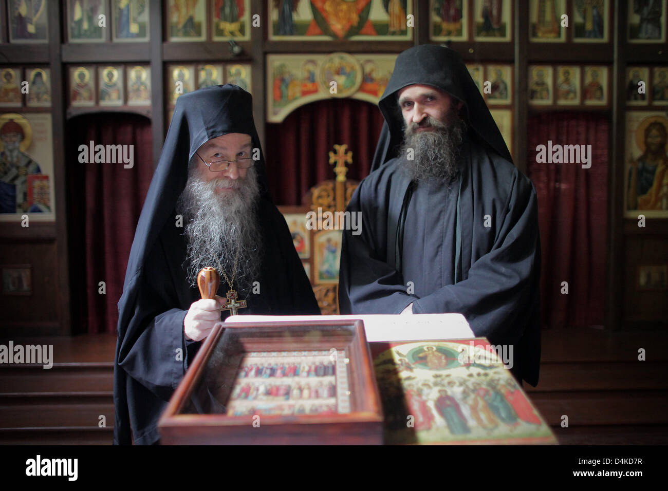 Abbot Basilius (L) and Father Paisius smile for the photographer at the ...