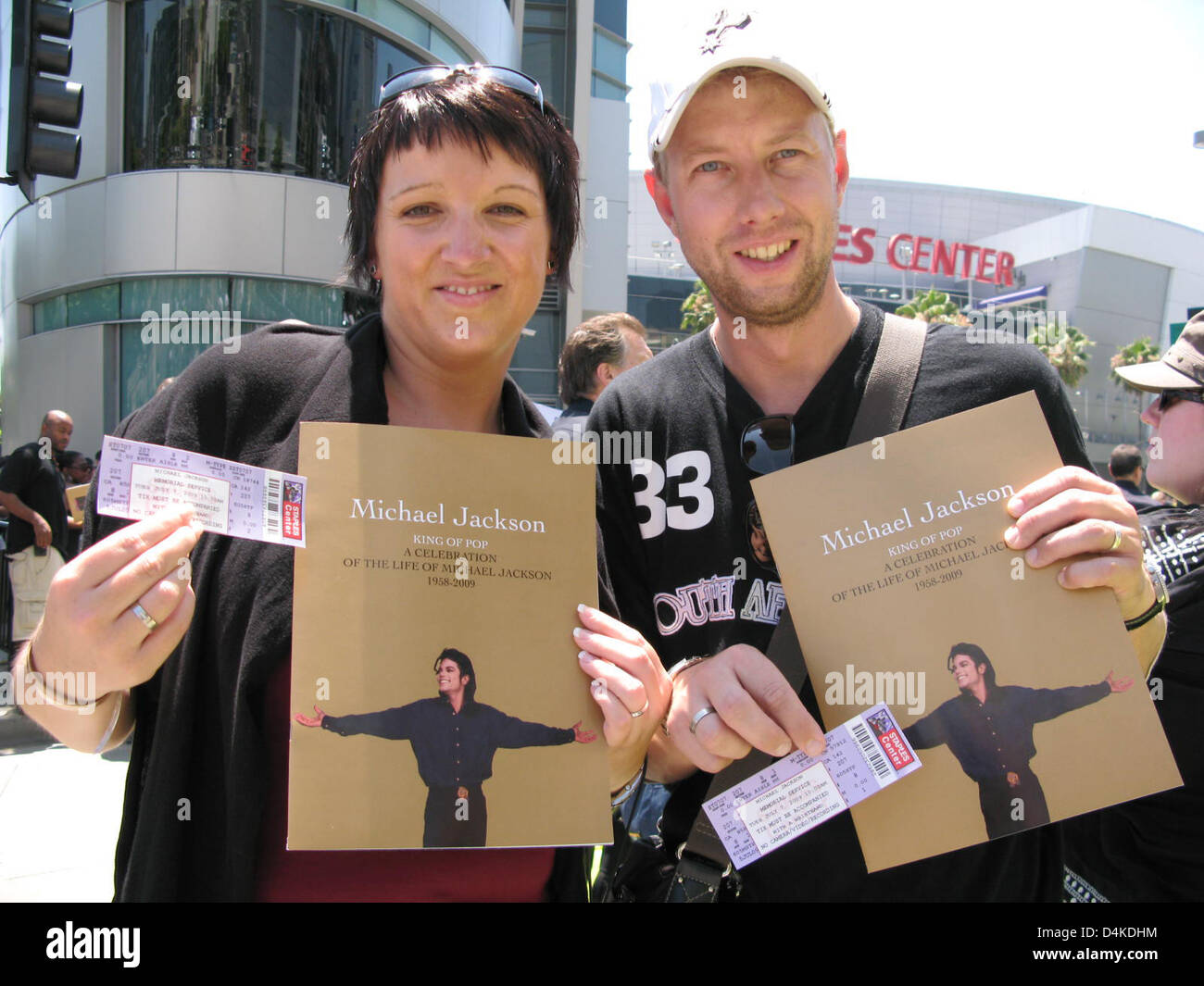 Germans Heike and Dirk Habbe present their tickets for the Michael ...
