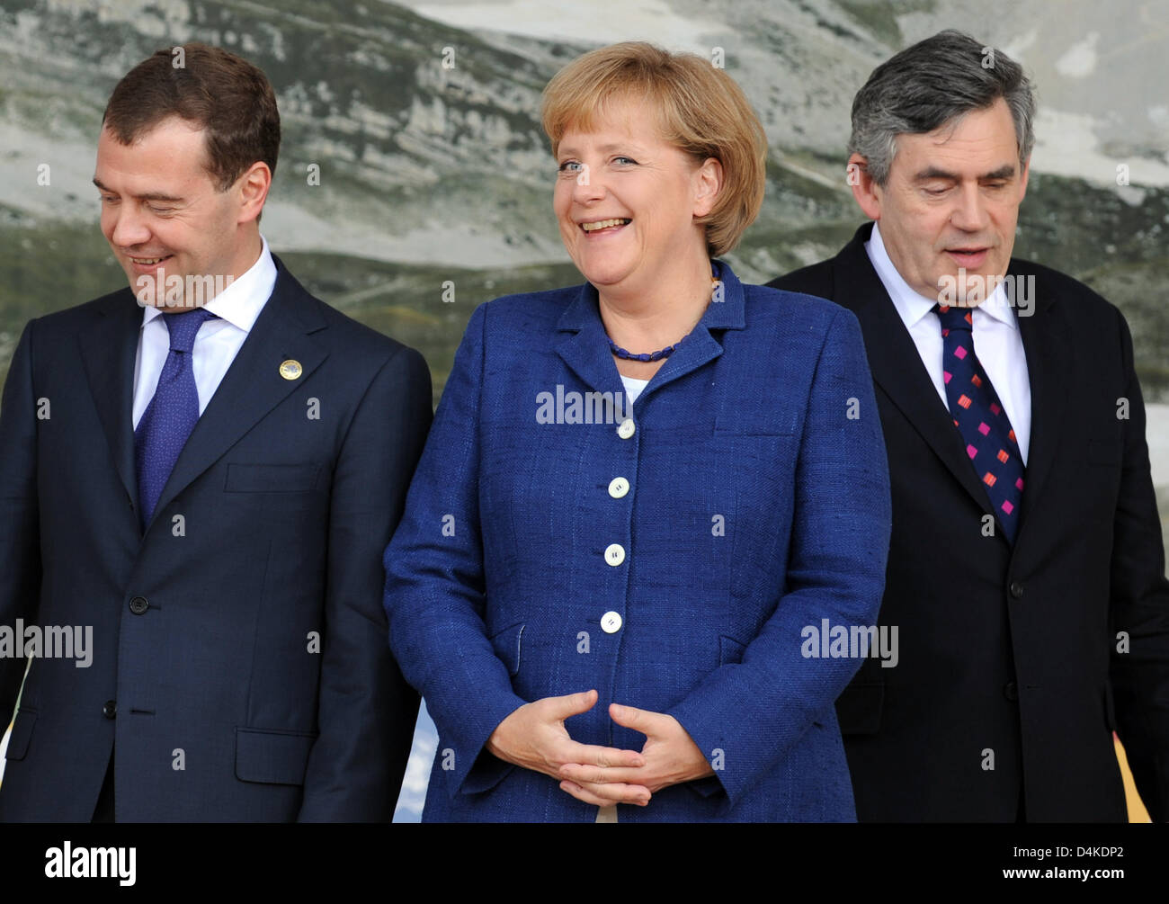 Russian President Dmitry Medvedev (L), German Chancellor Angela Merkel ...
