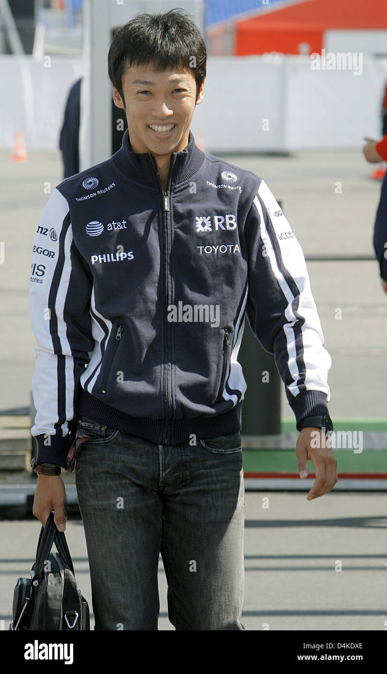 Japanese Formula One driver Kazuki Nakajima of Williams F1 arrives at ...