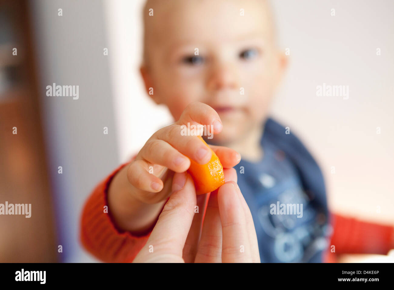 Adult hand reaching baby hand hi-res stock photography and images - Alamy