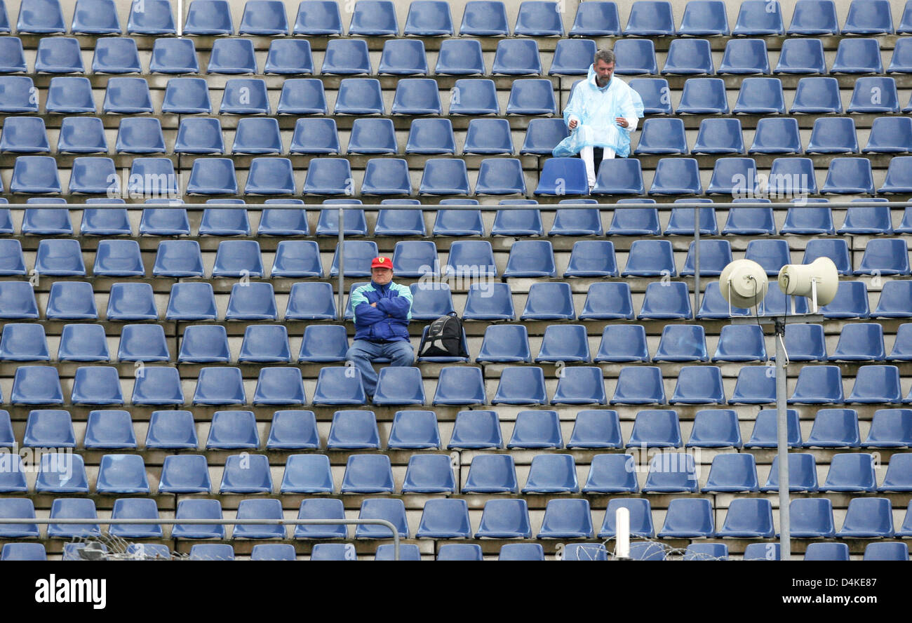 Fans sit on a grandstand of Nurburgring race track in Nuerburg, Germany ...