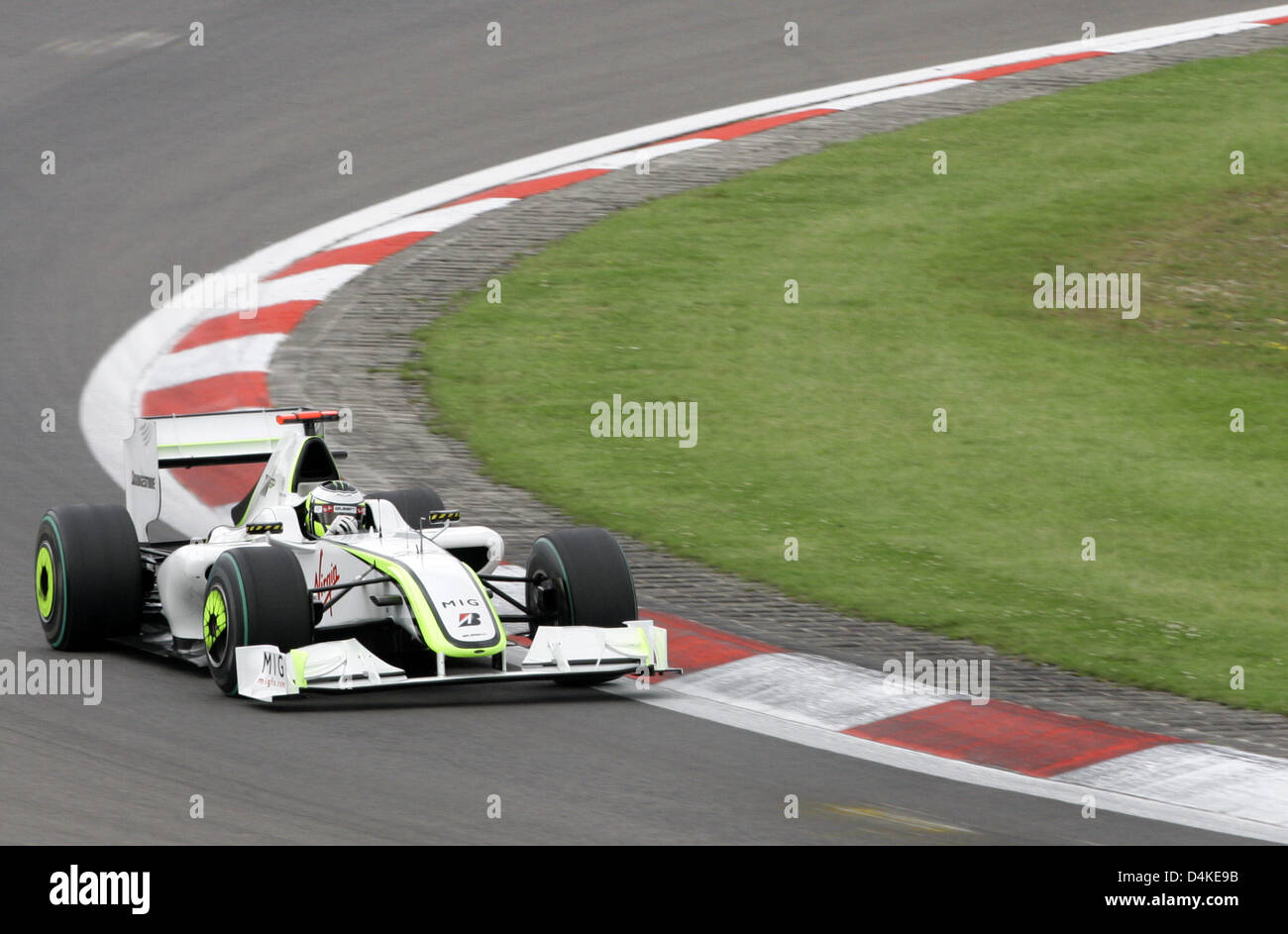 British Formula One driver Jenson Button of Brawn GP steers his car ...